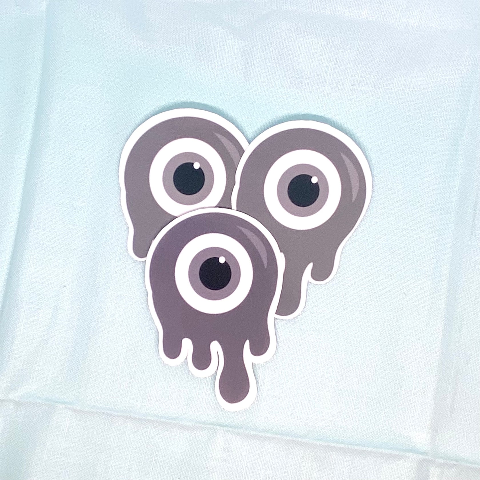 "Melting" Evil Eye - Grey – seismicstickers